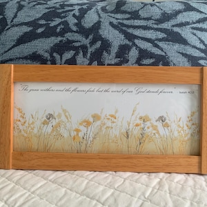 The Grass Withers and Flowers Fade but the World of Our God Stand ...