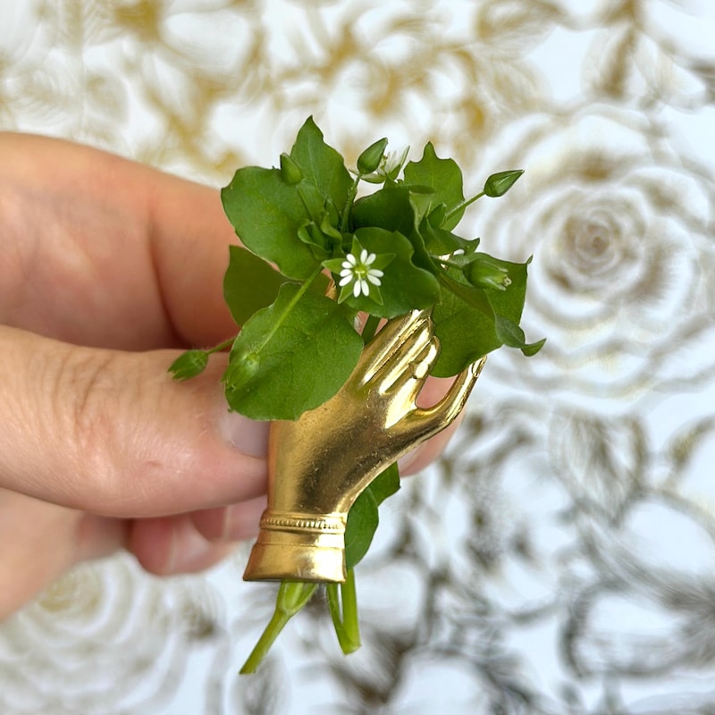 Flower Holding Hand Brooch - Etsy