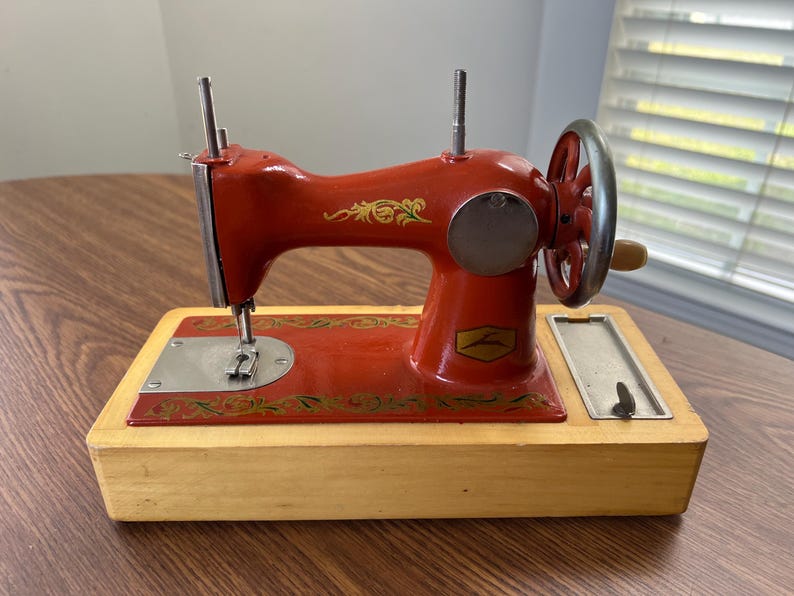 Vintage USSR Toy Sewing Machine | Red Metal, Wooden Base | Working ...