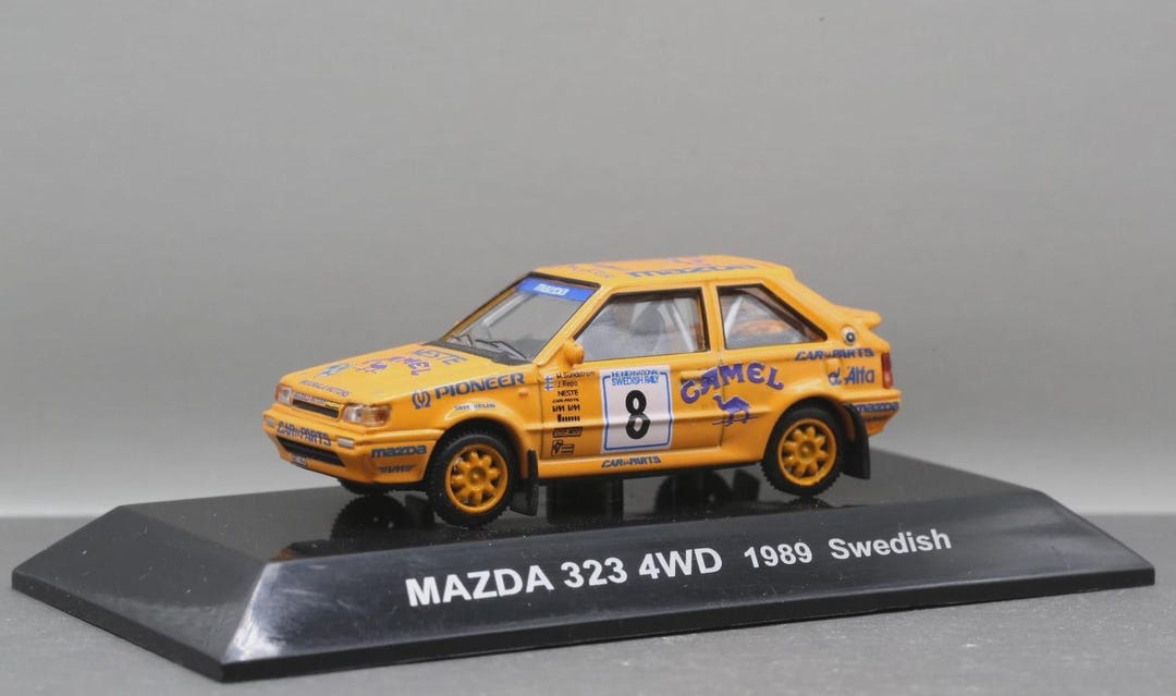 Cm's 1/64 Rally Car Collection SS.15 Mazda 323 Familia 4WD 1989 Swedish ...