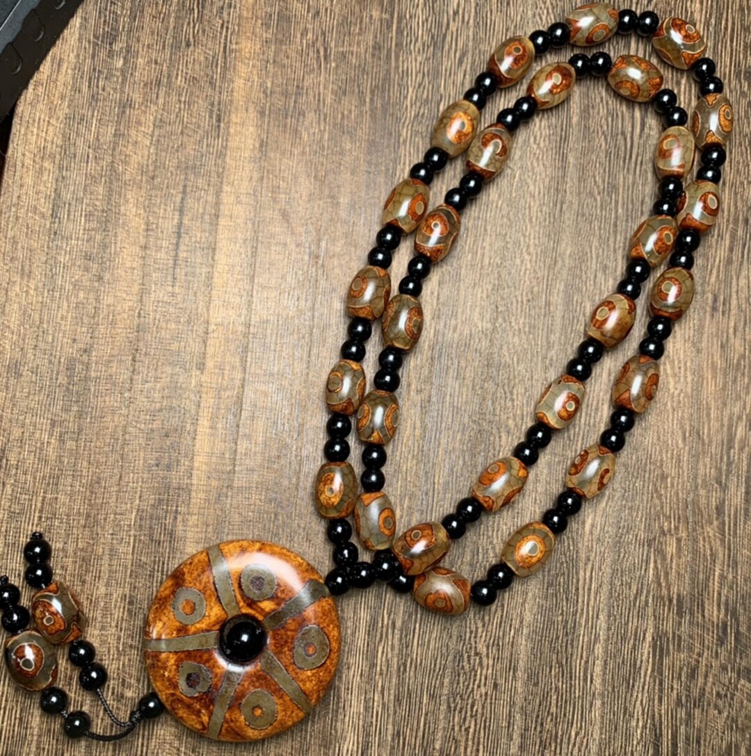 Tibetaner von drei Augen bis zehn-äugige Dzi Perlen-Halskette ...