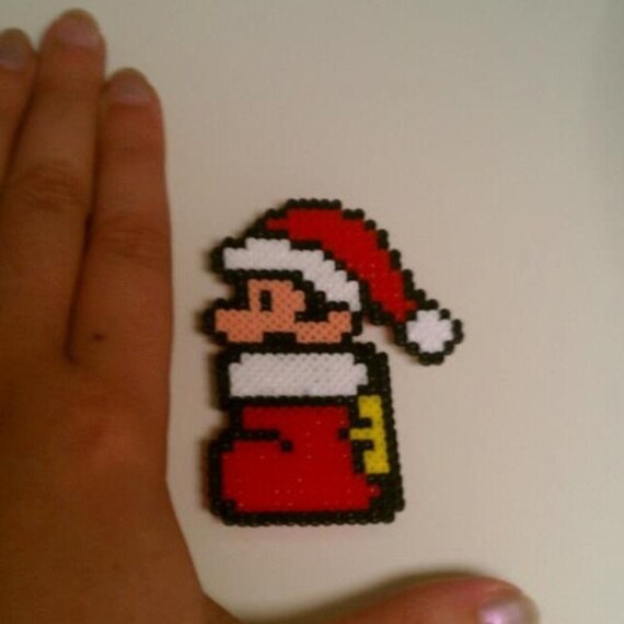 Items similar to Christmas Ornament - Santa Mario in a Goomba Stocking ...