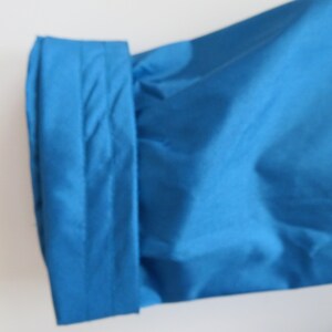 1980s Womens Hooded Turquoise Blue Raincoat by Totes - Size 14P - Long ...