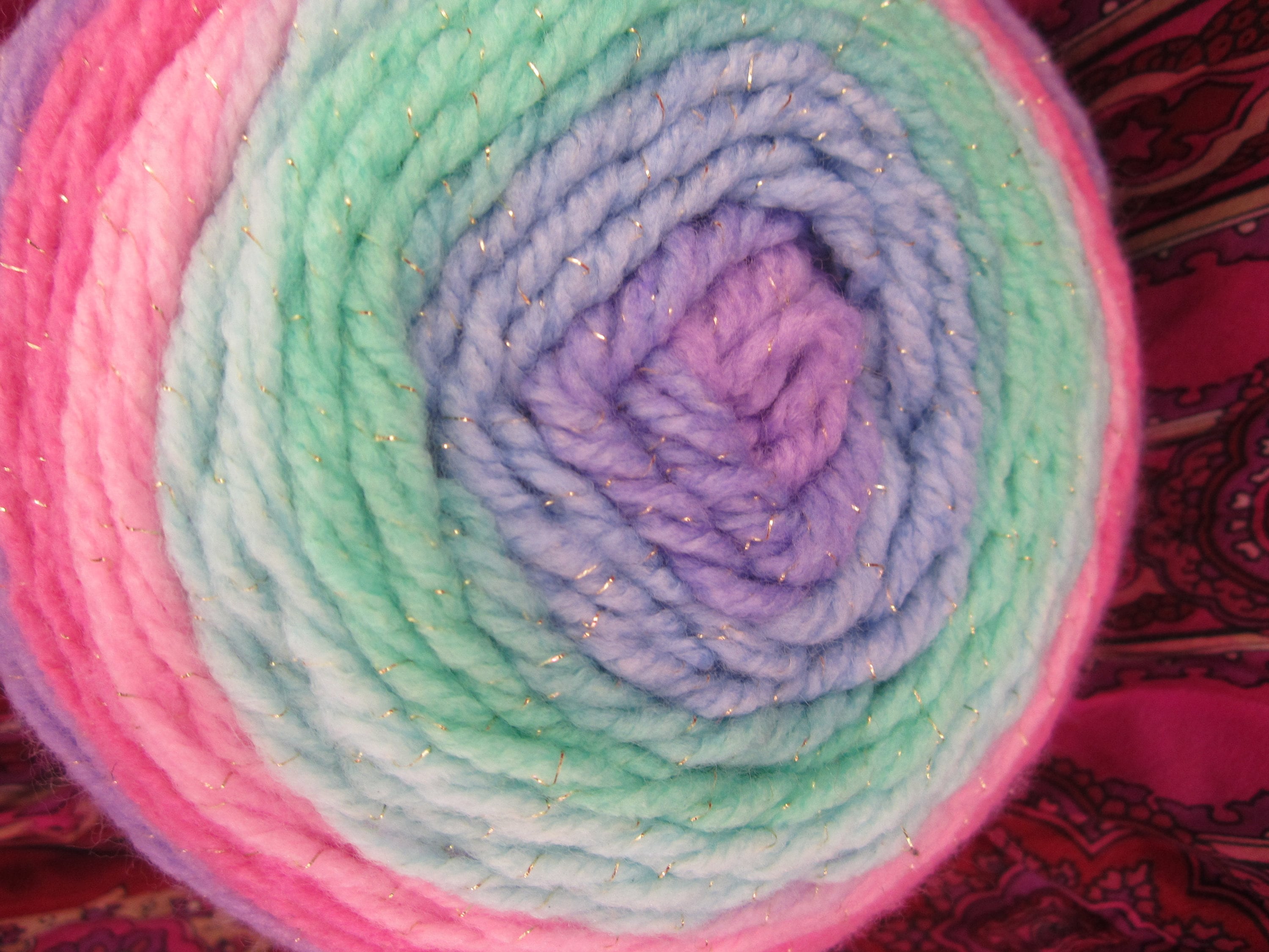Draco Lion Brand Mandala Sparkle yarn cake