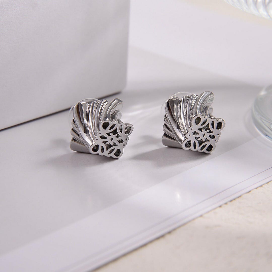 Vintage Pre-owned Loewe Silver Flowing Wave Logo Stud Earrings - Etsy