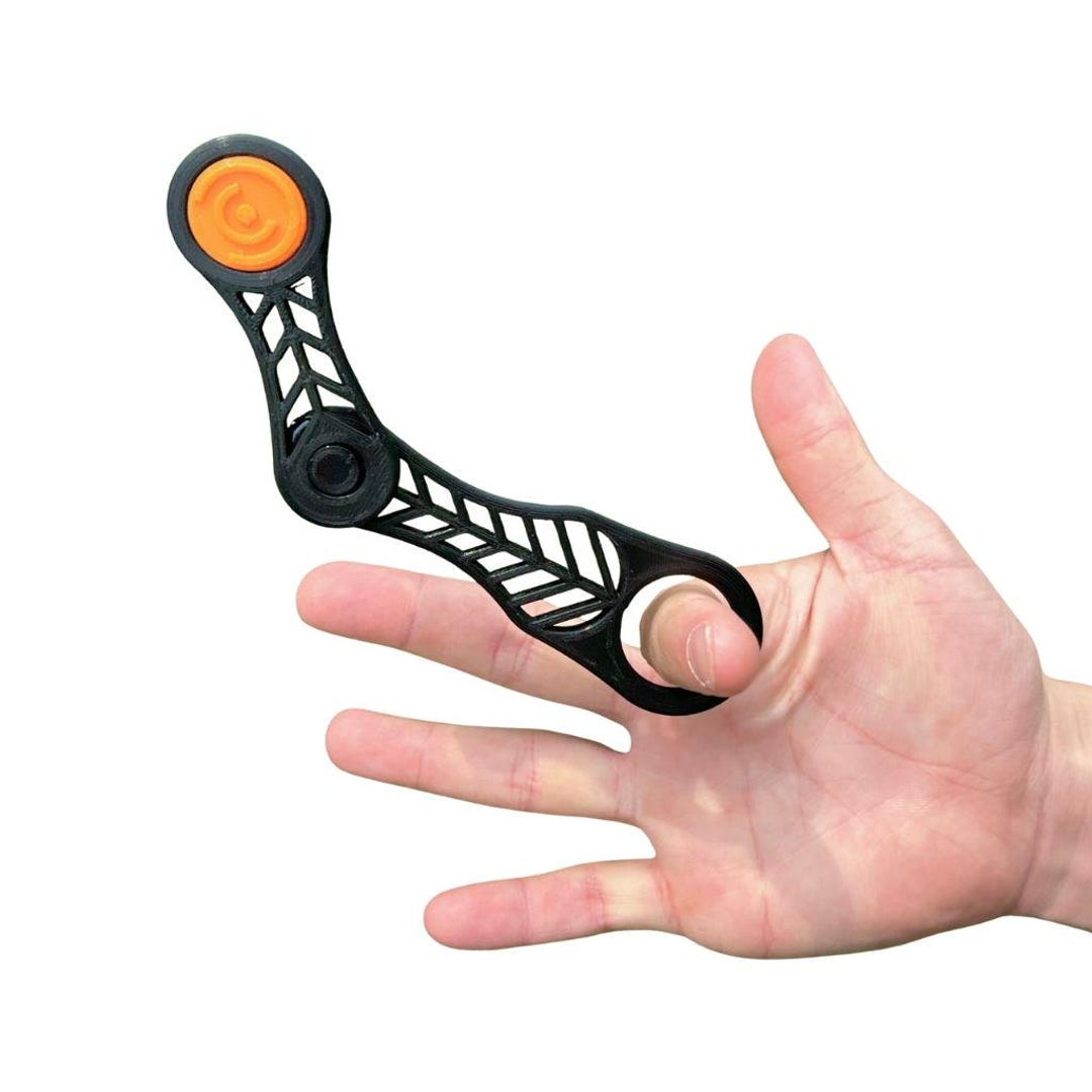 Finger Slinger Print in Place Spinning Fidge, Black Finger Catapult ...