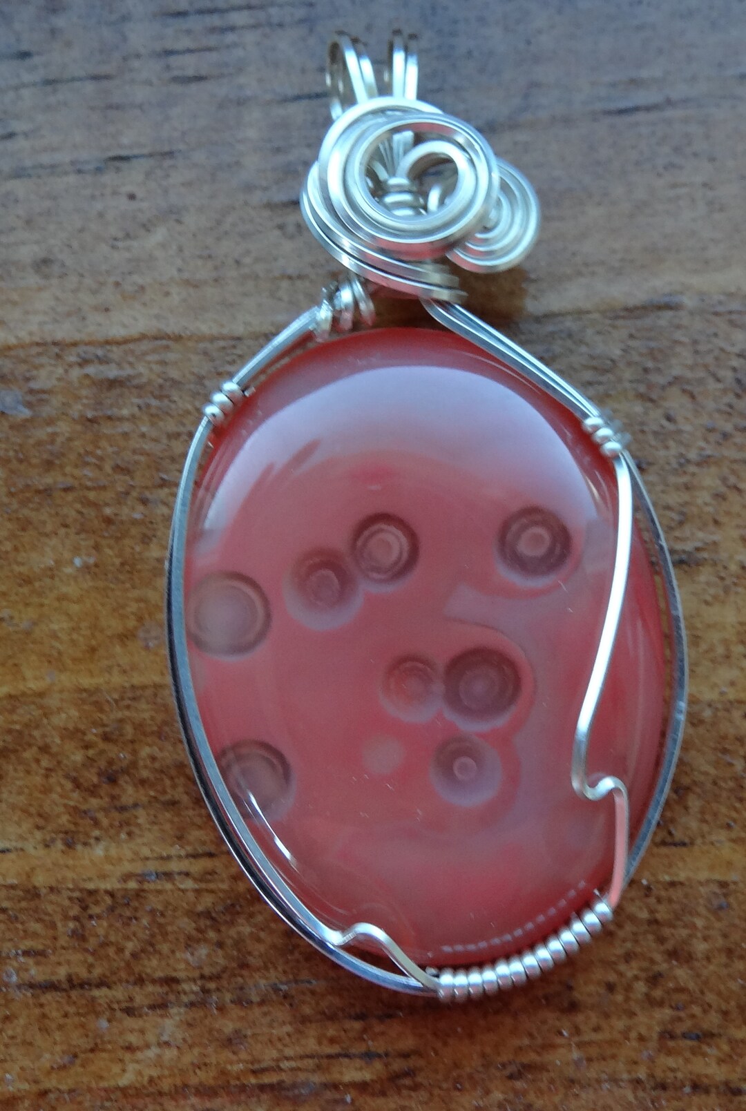 A Very Unique Light Salmon Colored Agate With Circles Inside Wire ...