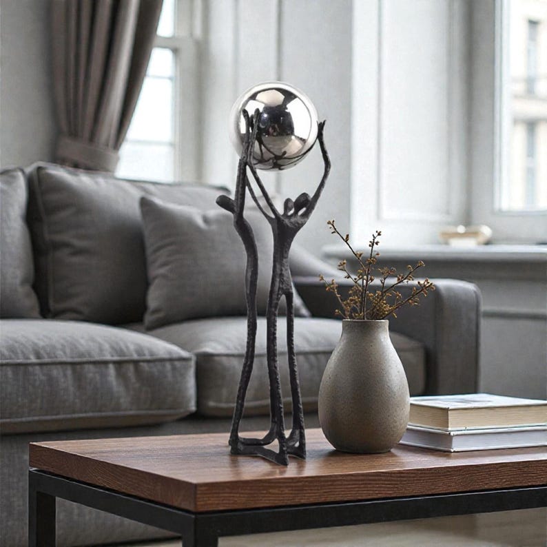 Abstract Metal Human Figure Sculpture With Golden Sphere | Modern Cast ...
