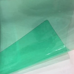 10 Gauge Tinted Transparent Plastic Vinyl Tinted 54 Inch Wide Fabric by ...
