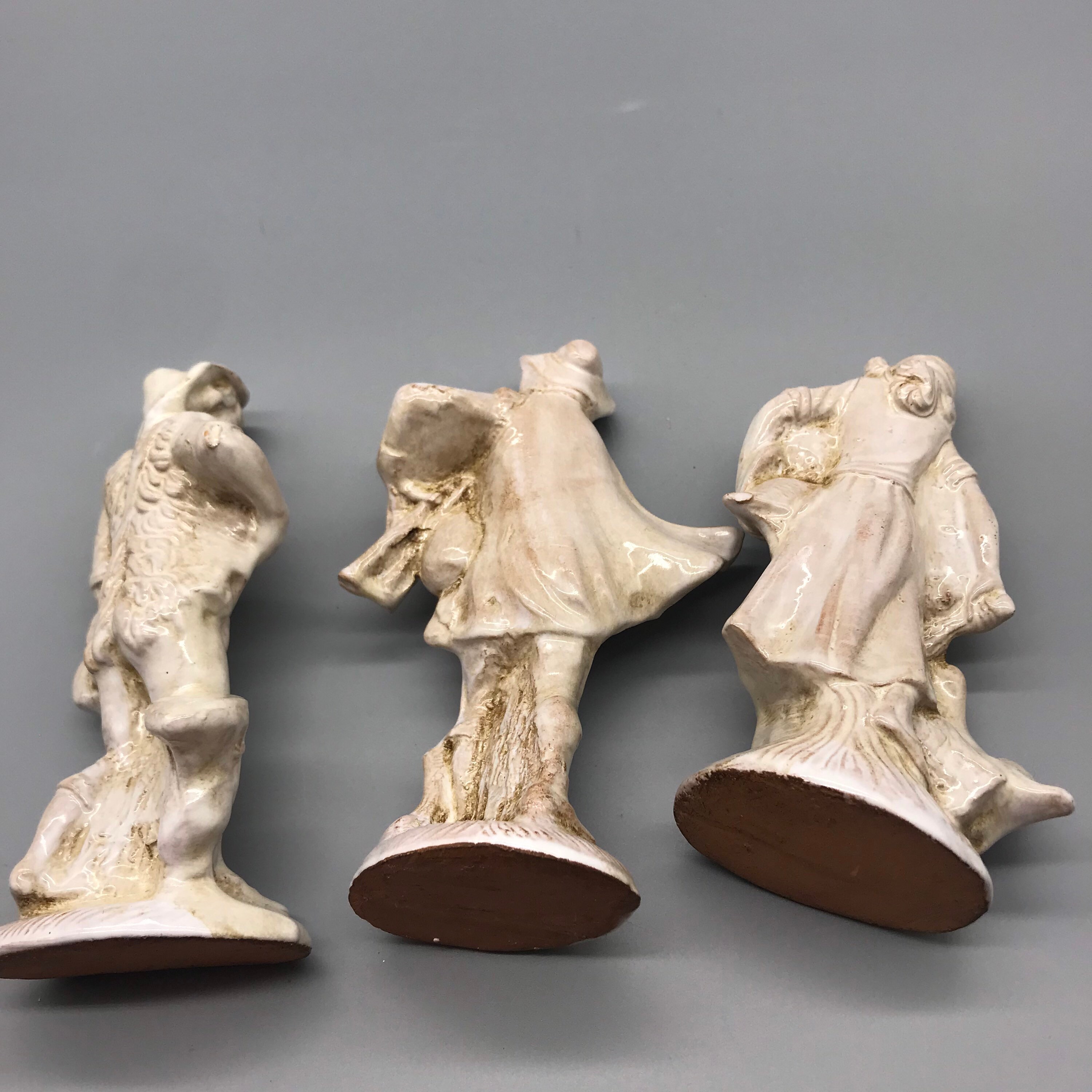 Trio of Pottery Figurines, Man Playing Pipes, Girl With Goose, Boy With ...