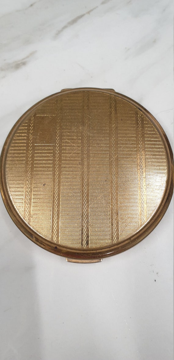 Pretty vintage brass stratton - Gem