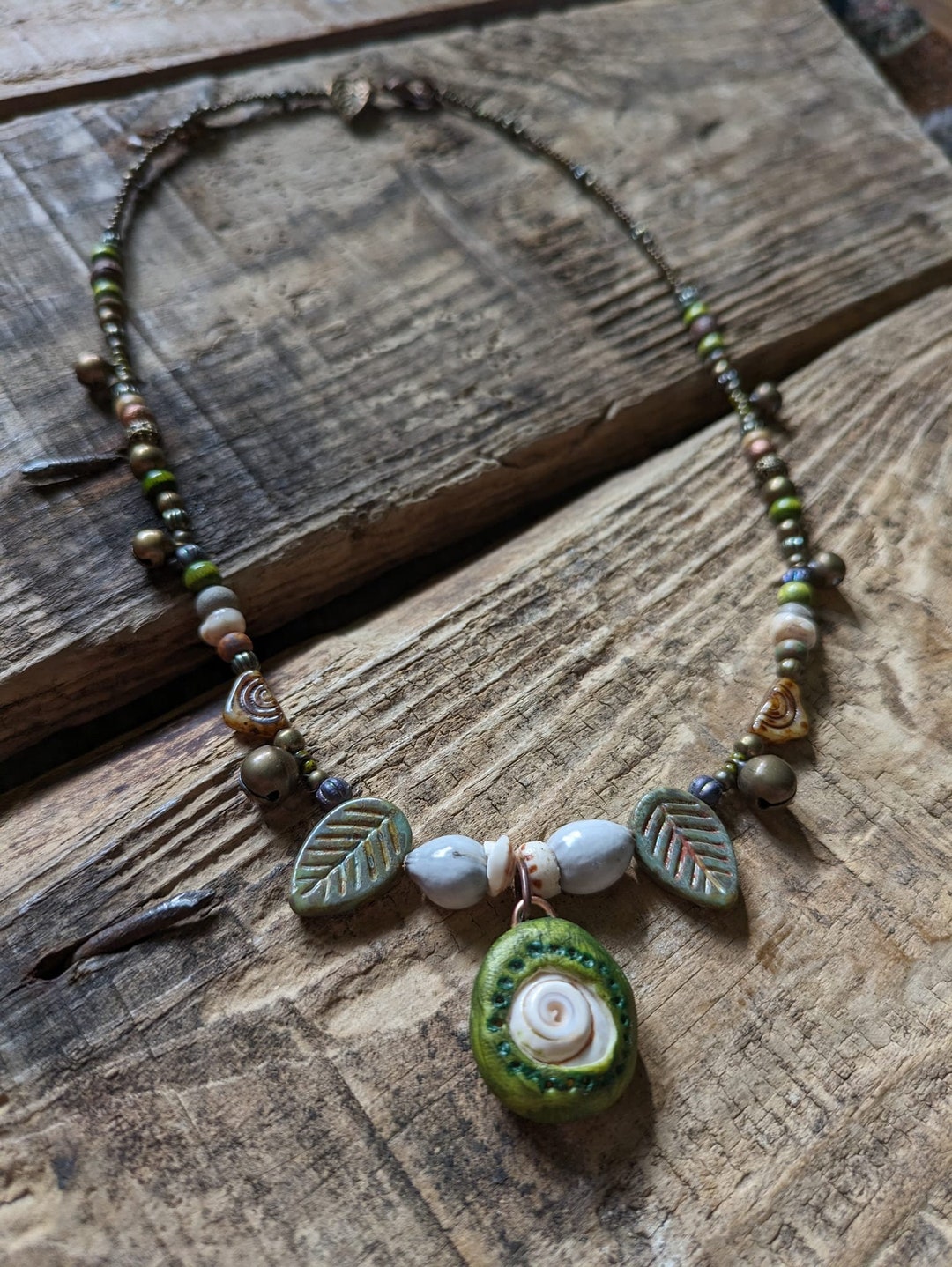 Earthy Necklace Spiral Shell Leaves Bells Magical Forest Jewelry Tree ...
