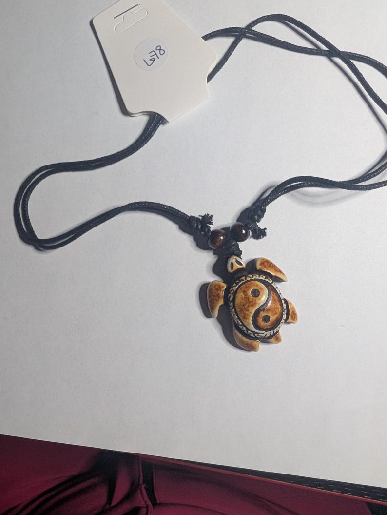 Spiral Turtle Necklace – Symbolic Boho Pendant – Black Cord - Etsy Canada