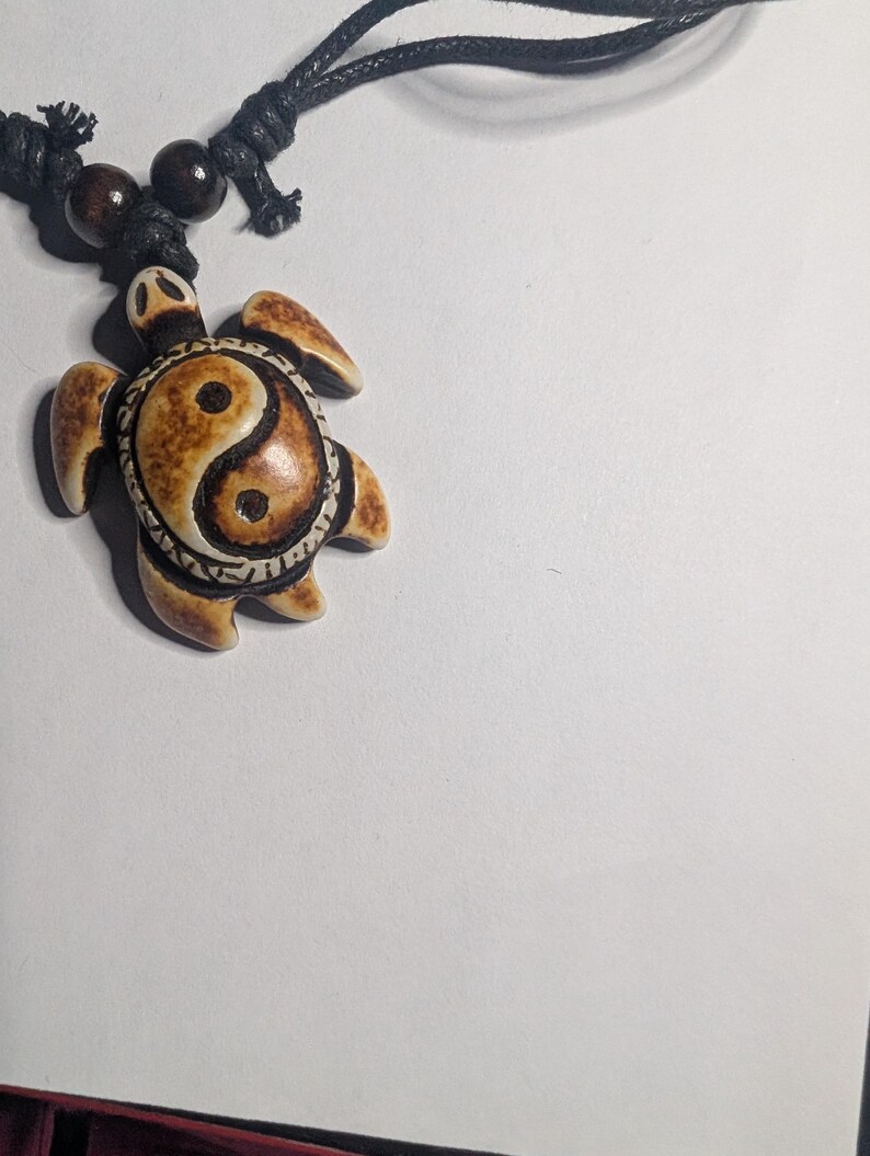 Spiral Turtle Necklace – Symbolic Boho Pendant – Black Cord - Etsy Canada