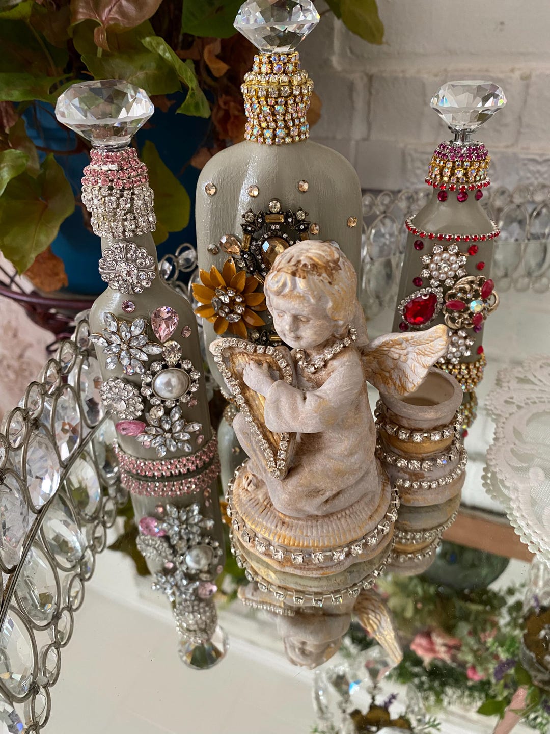 A Eclectic Vanity Set, 3 Unique Decorative Bottles and a Cherub Candle ...