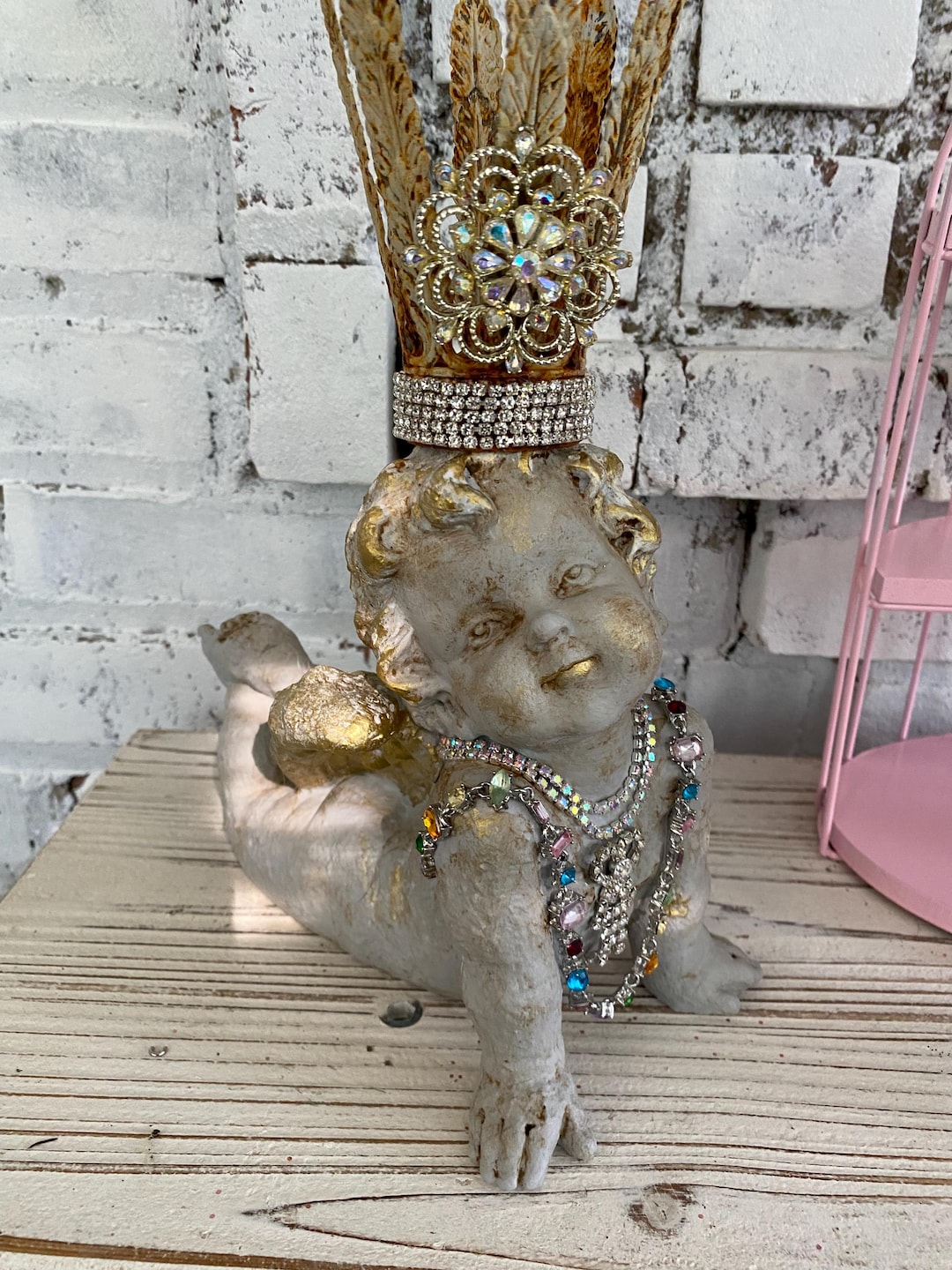 A Nordic Style Laying Cherub Statue, Rusty Metal Feathered Crown With ...