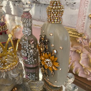 A Eclectic Vanity Set, 3 Unique Decorative Bottles and a a Crowned ...