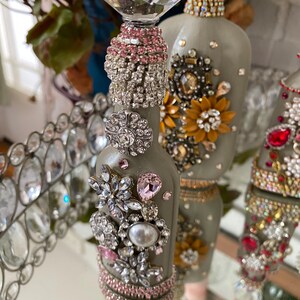 A Eclectic Vanity Set, 3 Unique Decorative Bottles and a Cherub Candle ...