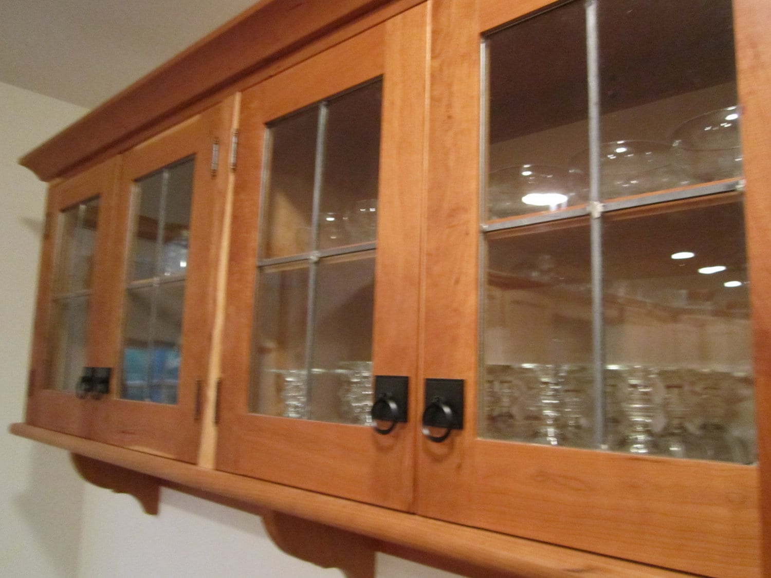 Wall cupboard with glass doors store
