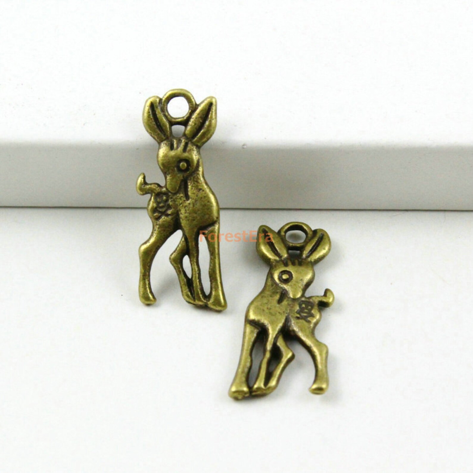 50pcs Antique Brass Deer Charm Deer Pendant 19x7mm (PND460) - Etsy