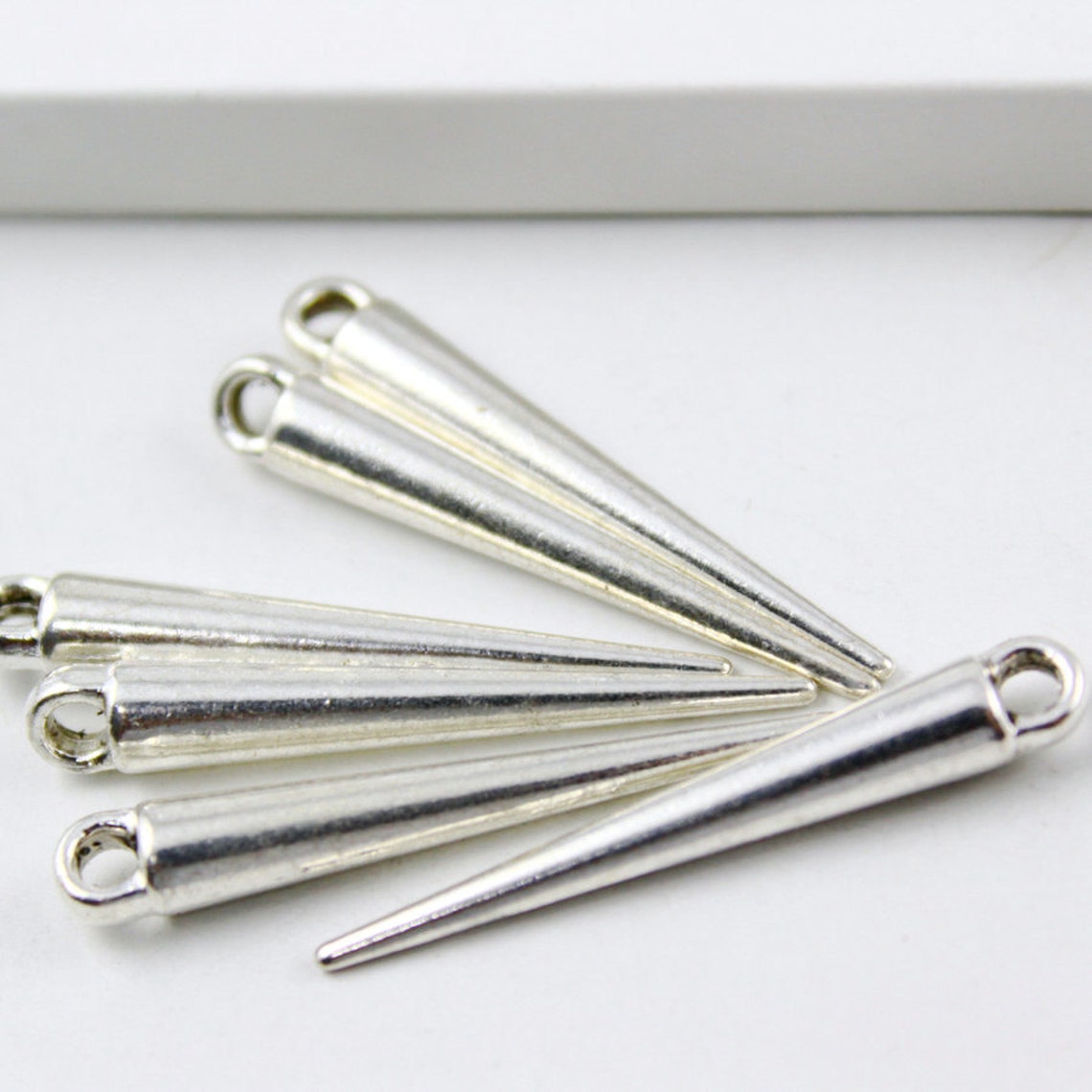 30pcs Antique Silver Spike Charm Spike Pendant 34x5mm PND354 - Etsy