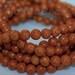 16" Strand - 6mm RUST Dark Brown Natural RIVERSTONE - Round Opaque ...