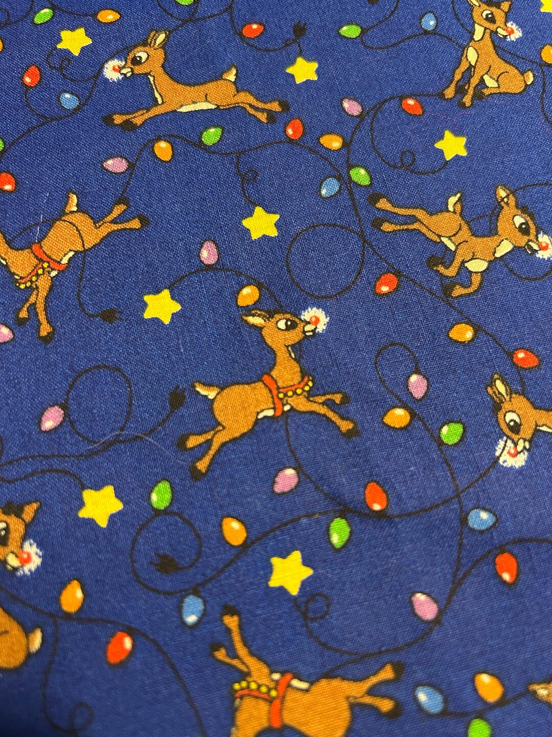 Rudolph the Red Nosed Reindeer Christmas Fabric by VIP Cranston Fabrics ...