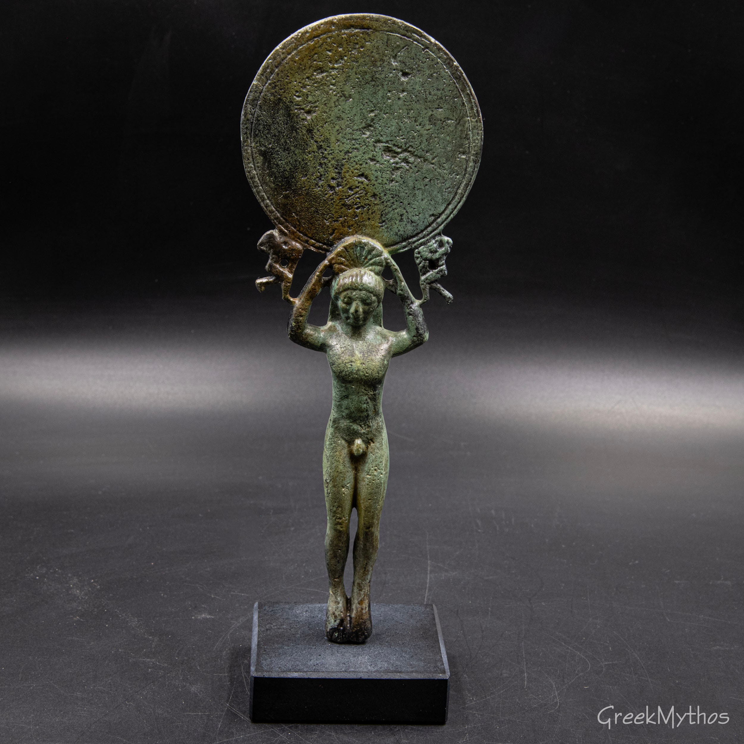 Ancient Greek Bronze Mirror with Support of a Young Boy and Two Cupids ...