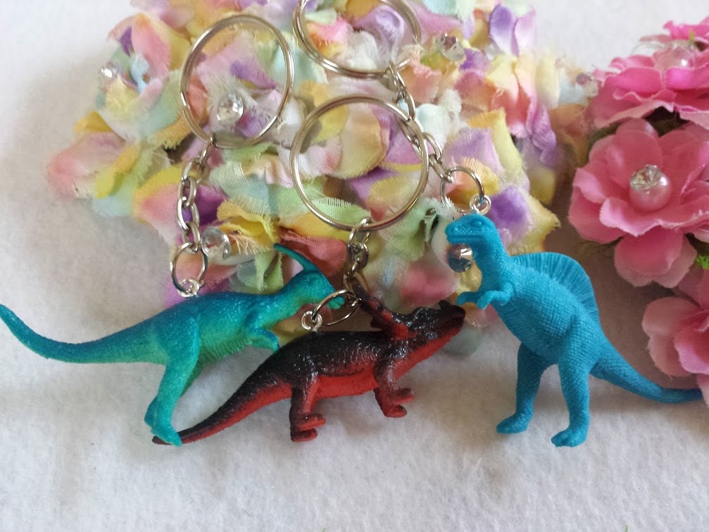10 Dinosaur Key Holders Party favors or Cupcake toppers. | Etsy