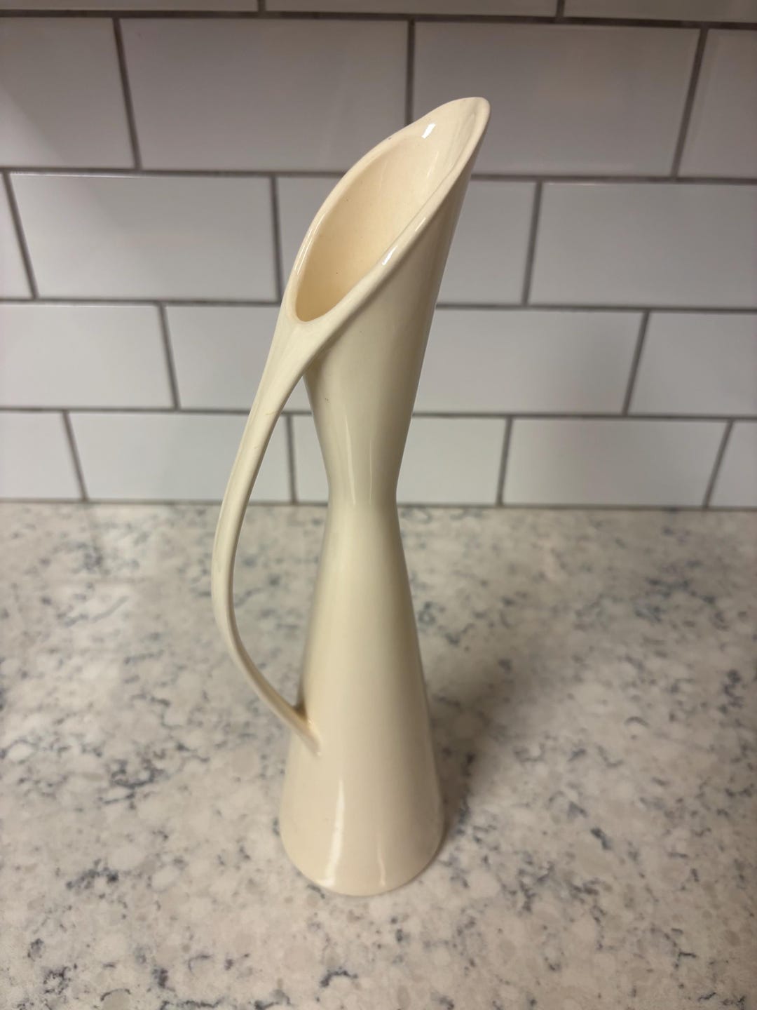 MCM Cream Ceramic Vase With a Distinctive Flowing Handle and ...