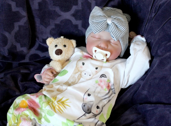 Weighted newborn doll store
