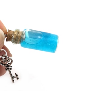 Glow in the Dark Drink Me Bottle Necklace - Alice's Adventures in ...