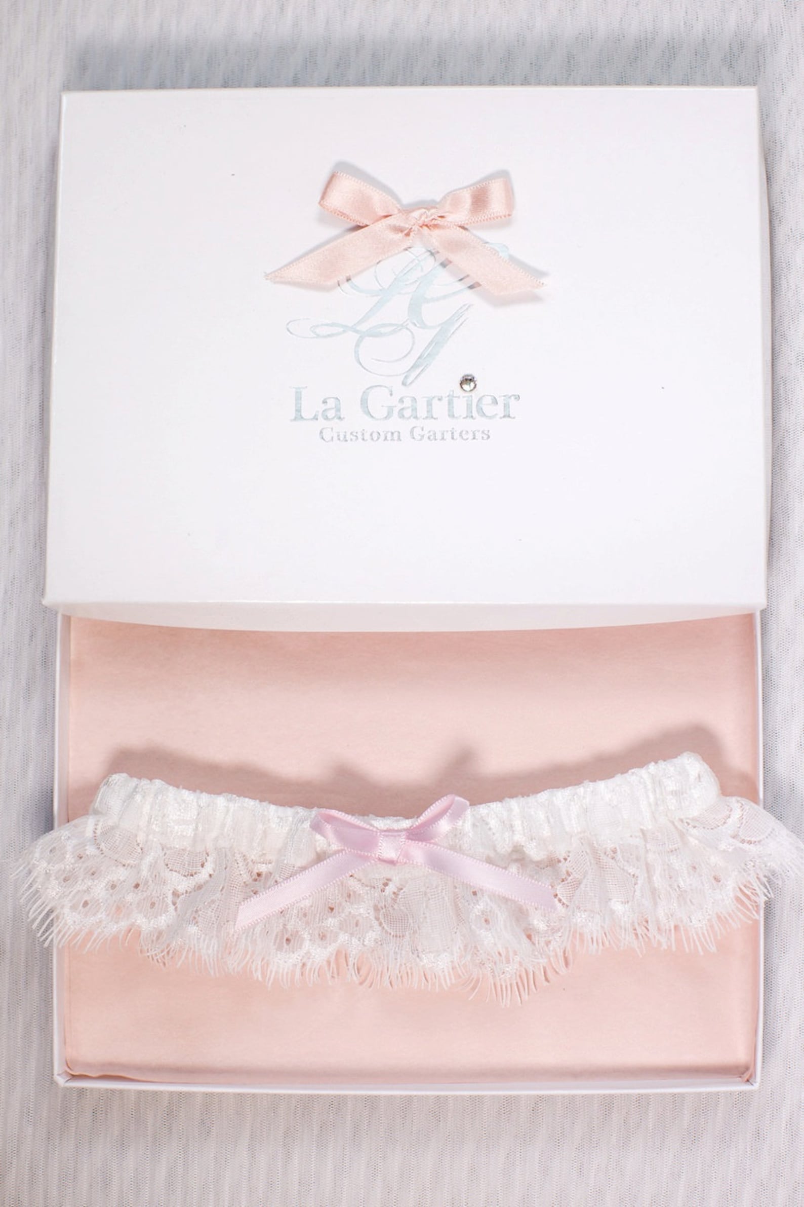 Delicate French Lace Toss Garter Delicate Lace Garter With Pink Bow ...