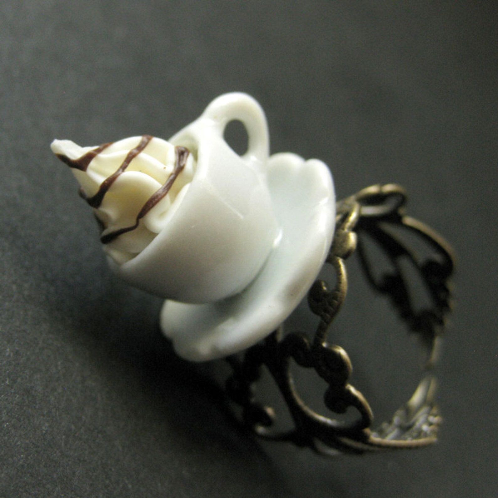 Ice Cream Ring With Chocolate Syrup Topping. Dessert Ring. White Teacup ...