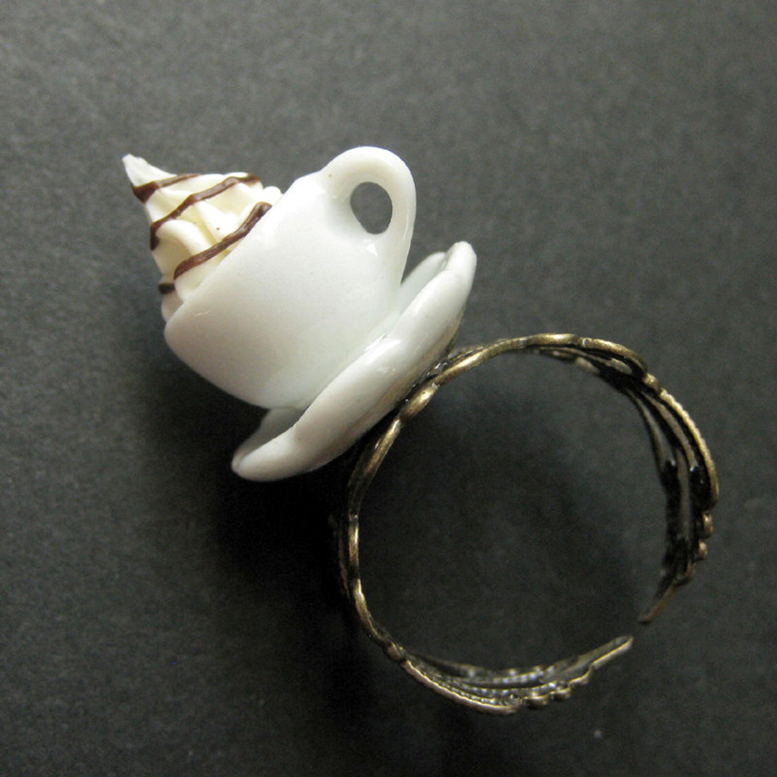Ice Cream Ring With Chocolate Syrup Topping. Dessert Ring. White Teacup ...