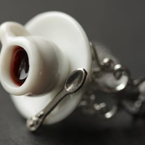 Coffee Cup Ring. Coffee Ring. White Teacup Ring With Coffee and Spoon ...