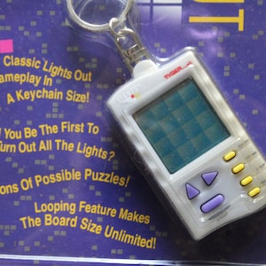 Vintage New Tiger Electronic Handheld Lights Out Keychain Game 1997 - Etsy