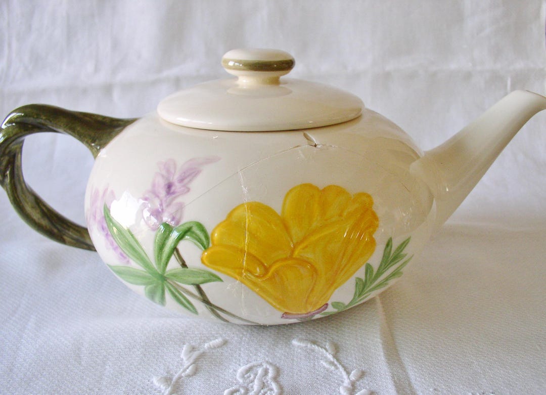 Franciscan Poppy Tea Pot ... California Pottery....damaged and Repaired ...