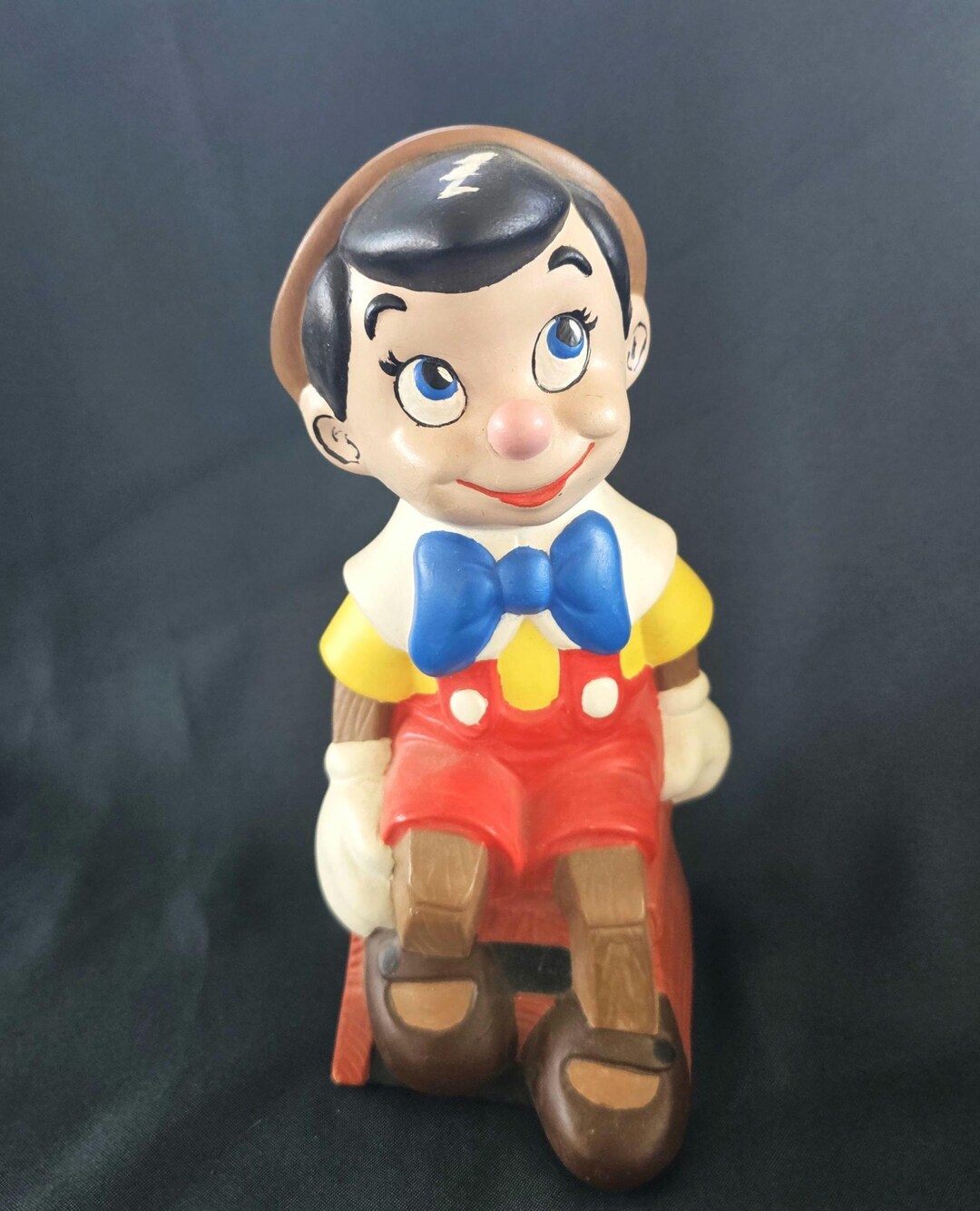 Pinocchio Ceramic Sitting on Stool - Etsy