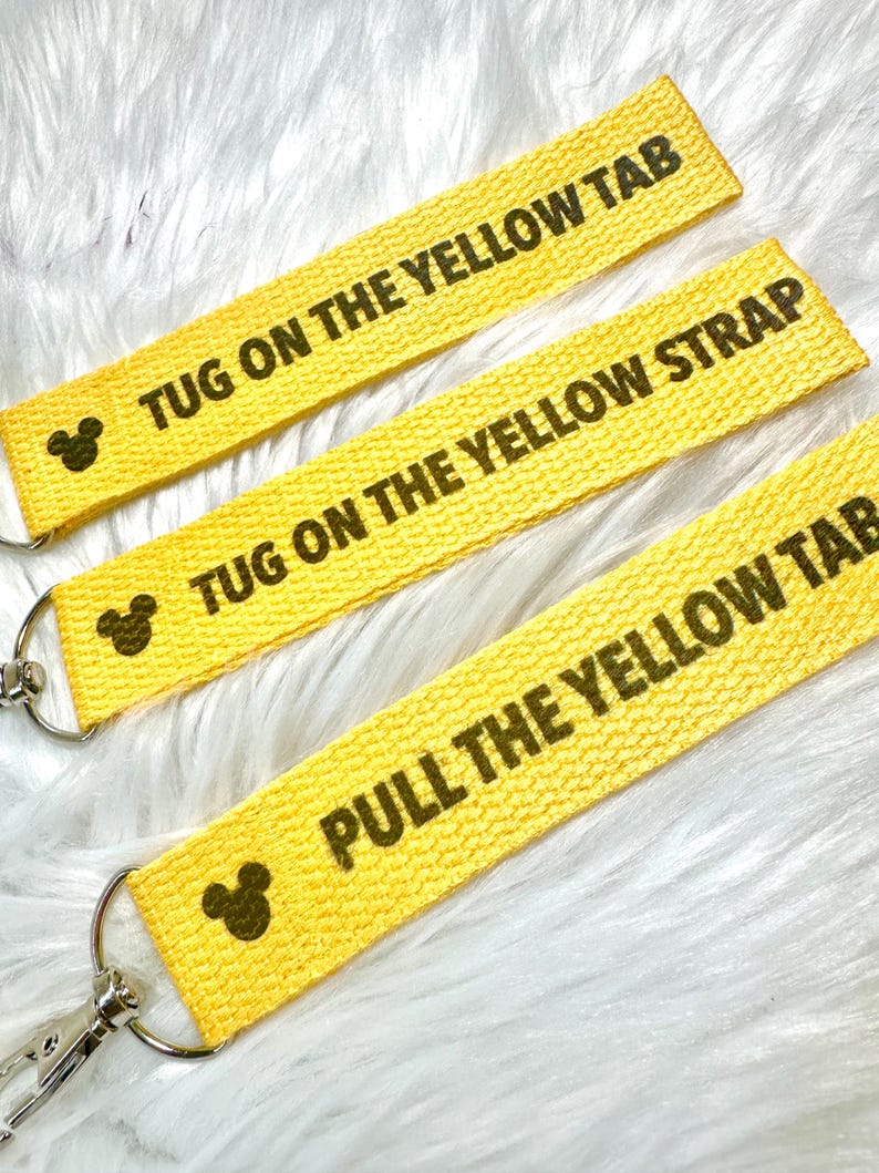 Pull the Yellow Tab Keychain | Theme Park Keychain | Yellow Strap ...