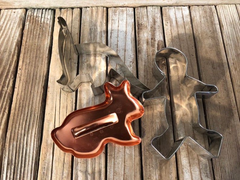 vintage-set-of-copper-and-metal-cookie-cutters-gingerbread-man