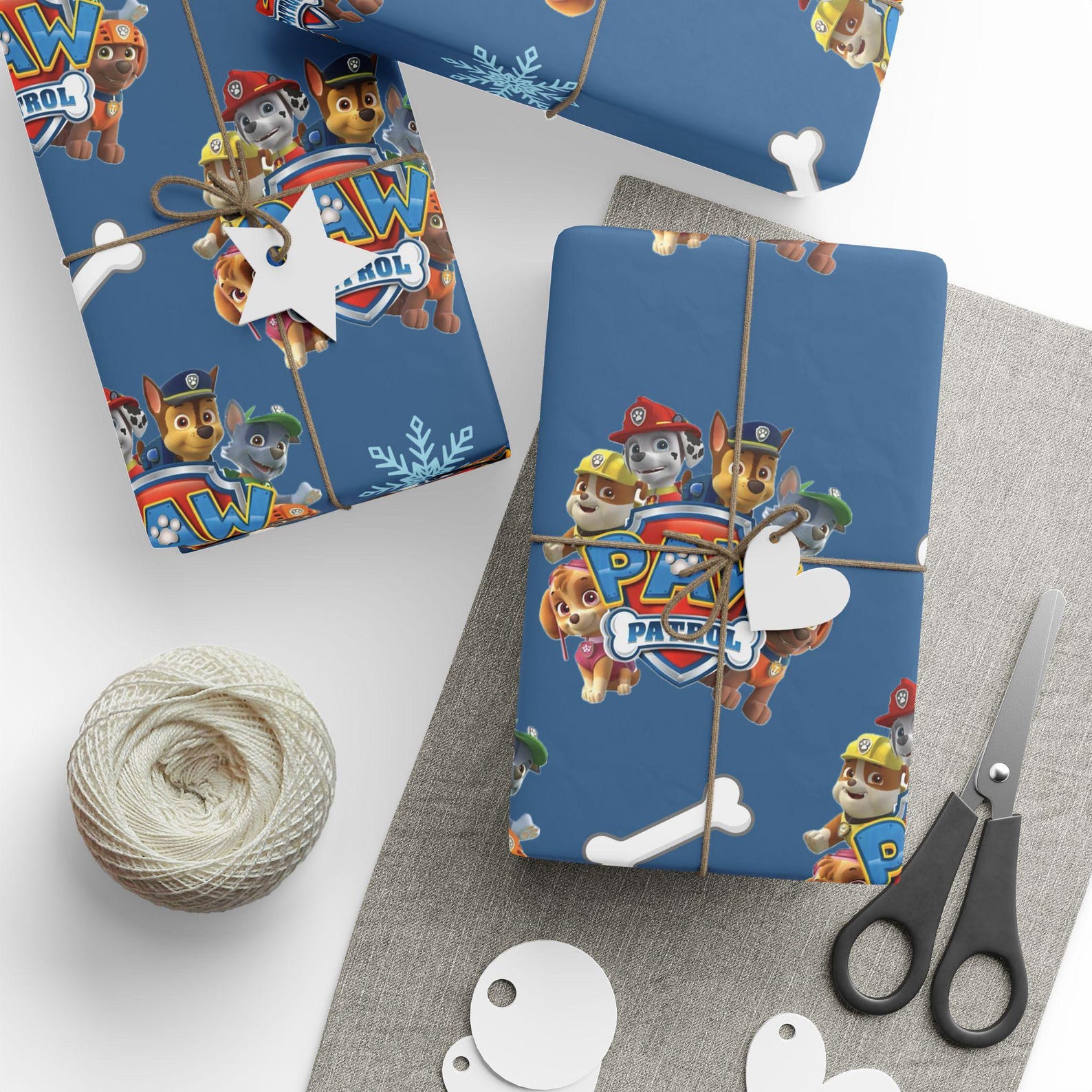 Festive Paw Patrol Crest Wrapping Paper | Dog Bones Snowflake Pattern ...