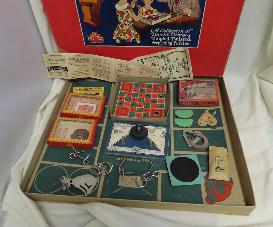 Antique Super Puzzles Sherm's Collection World Famous Tangled Twisted ...