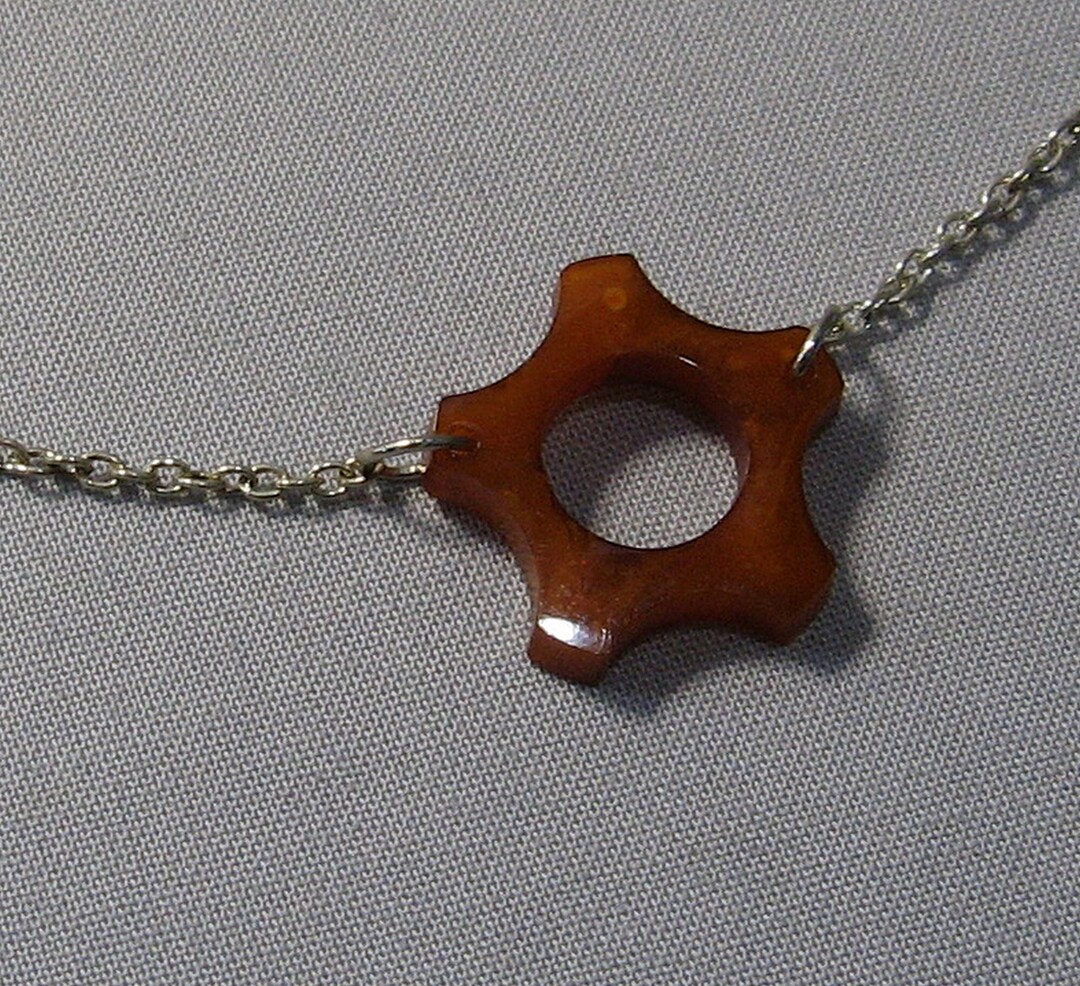Bakelite Gear Necklace - Etsy