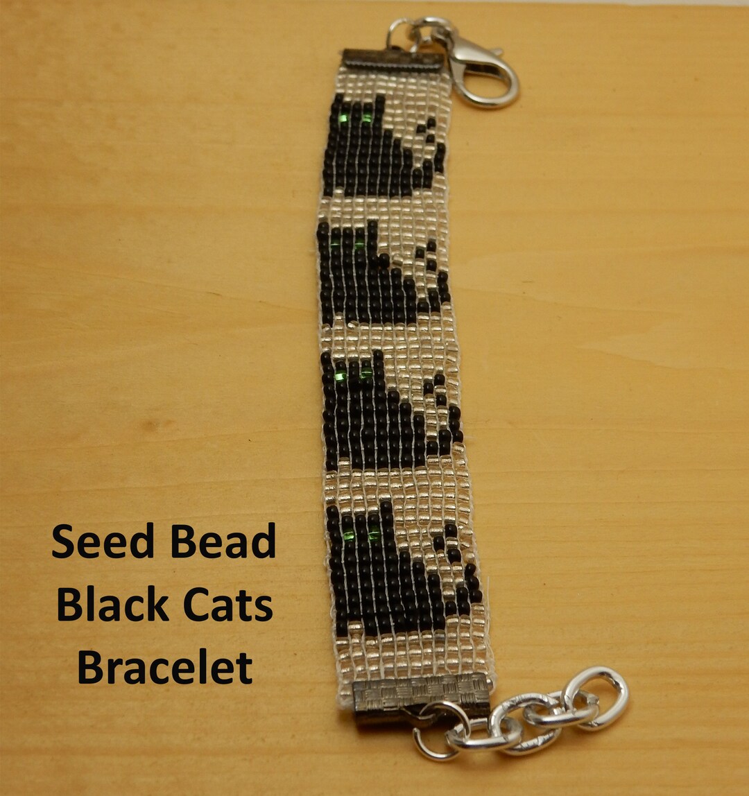 Black Cats Bracelet, Black Cats, Green Eyes on a Clear Background ...