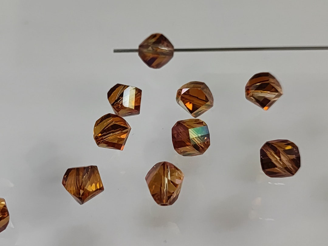 Swarovski Crystal Faceted COPPER Helix Beads 5020 - Select 6mm and 8mm Wholesale Jewelry ...