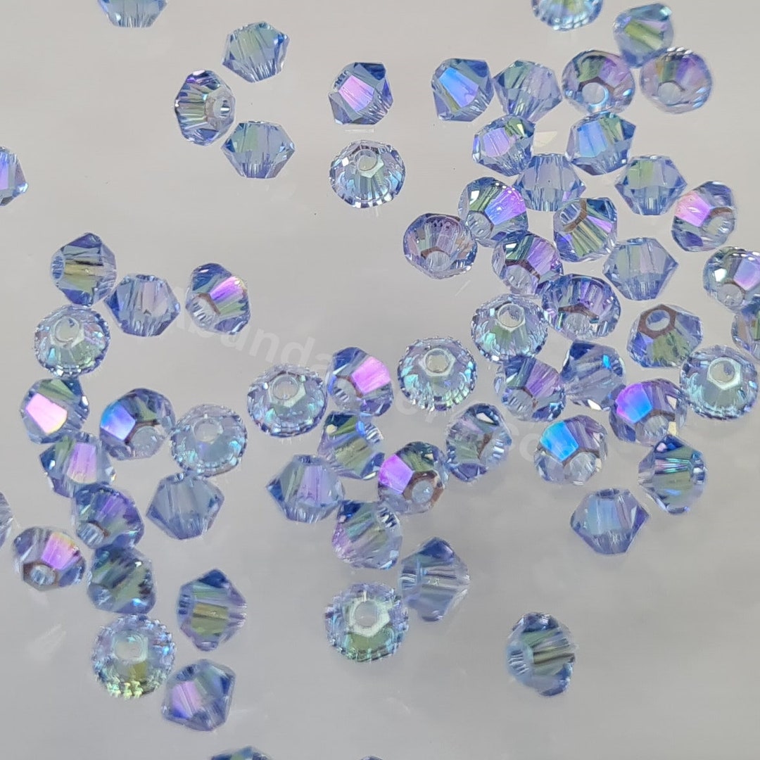 Swarovski Crystal Bicone Beads 5328 5301 Xillion Color : Light Sapphire ...