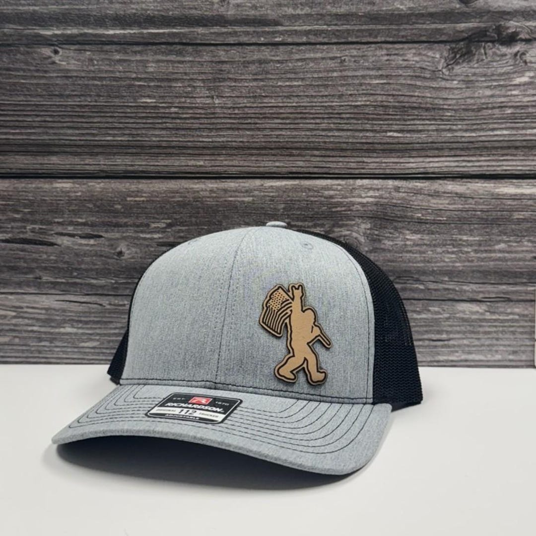 Patriotic Bigfoot Leather Patch Hat: Bigfoot Carrying Flag, Adjustable ...