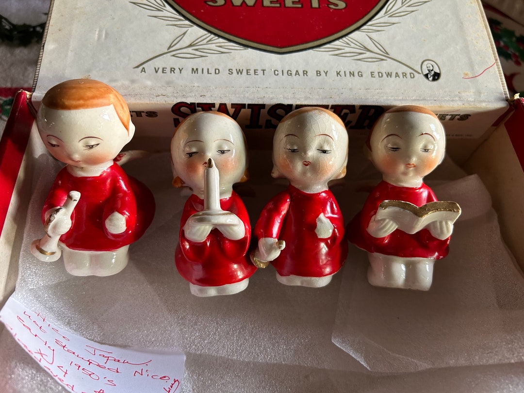 HICO or .... Angel Figures Made of Ceramic Eyes Are Almost Closed on ...