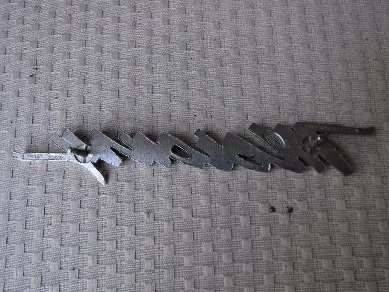 Mercury Script Emblem CIMB 6204480-1 Number to Rt on Back and Left 1959 ...